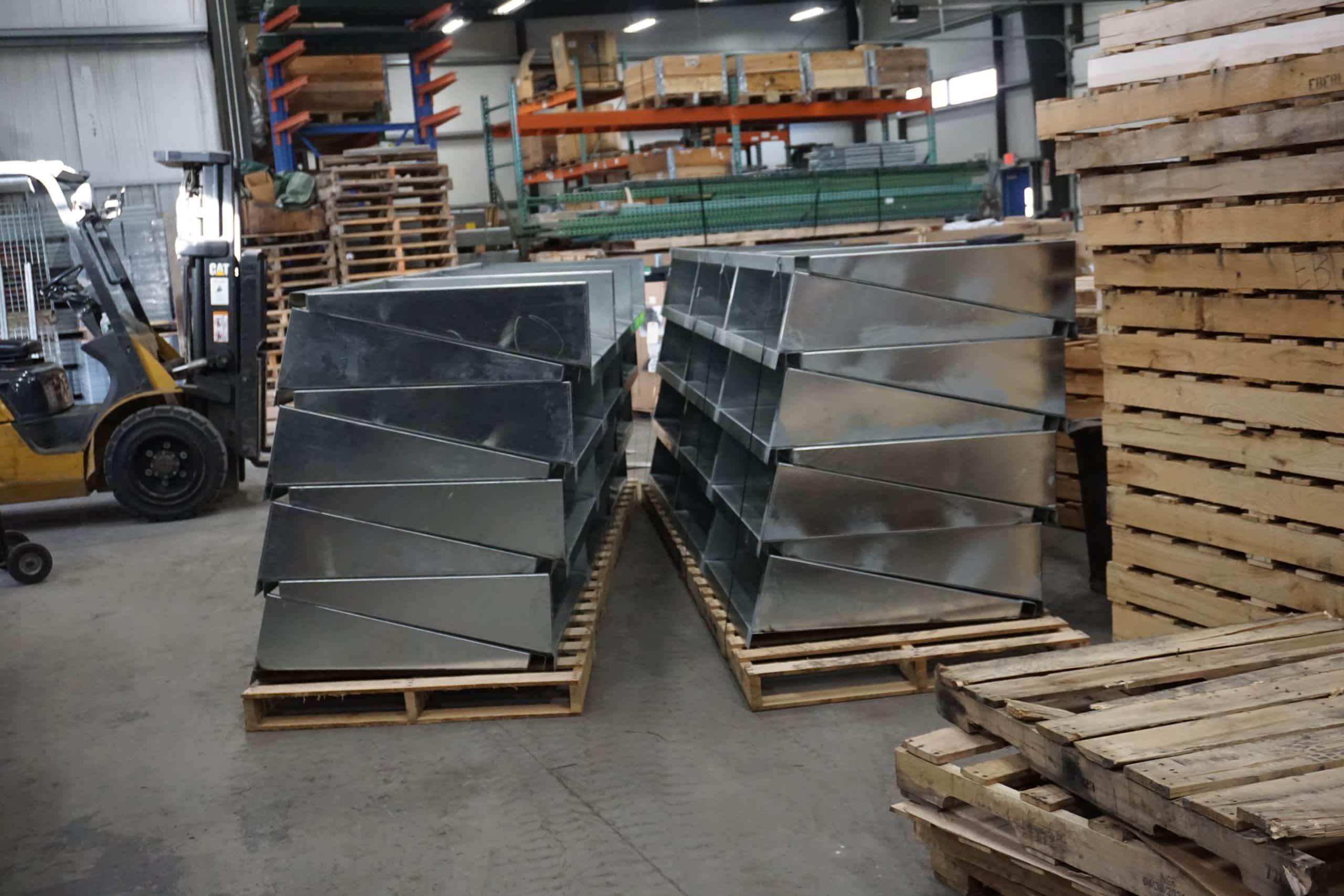 Loading Docks Protected By Custom Fabricated Metal Hoods