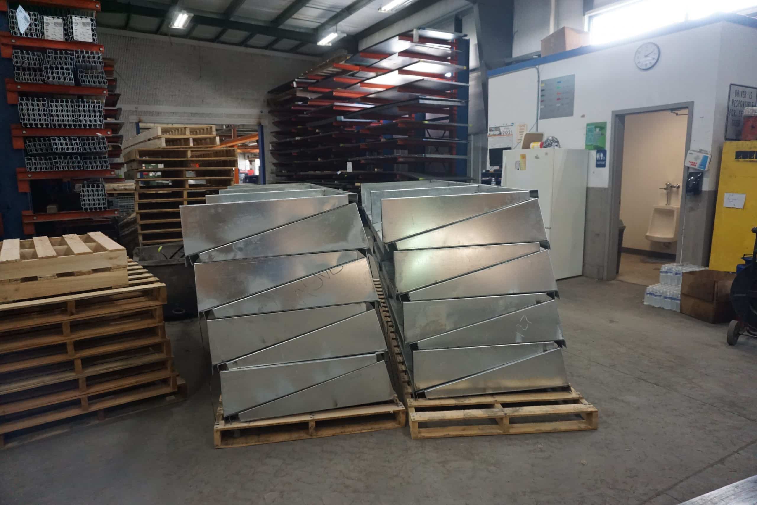 Loading Docks Protected By Custom Fabricated Metal Hoods