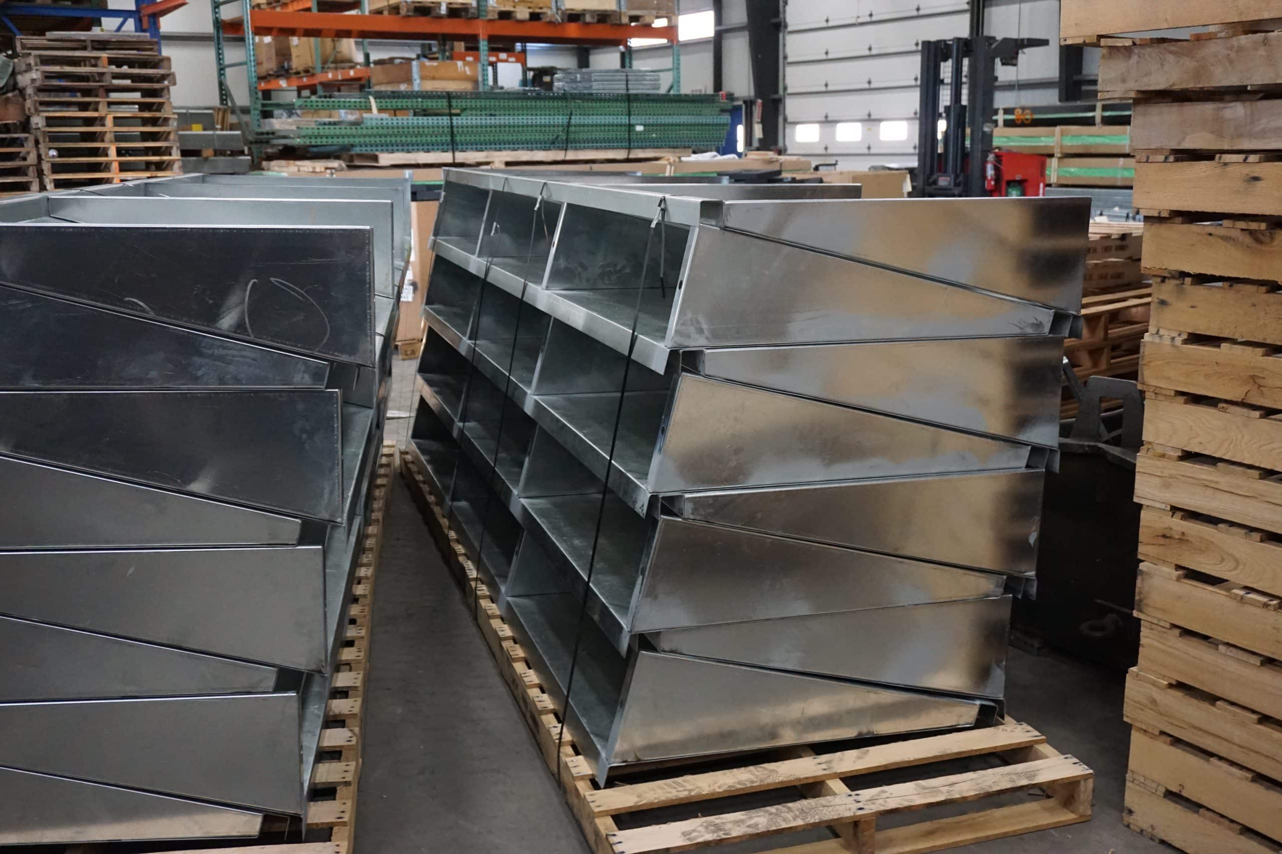 Loading Docks Protected By Custom Fabricated Metal Hoods